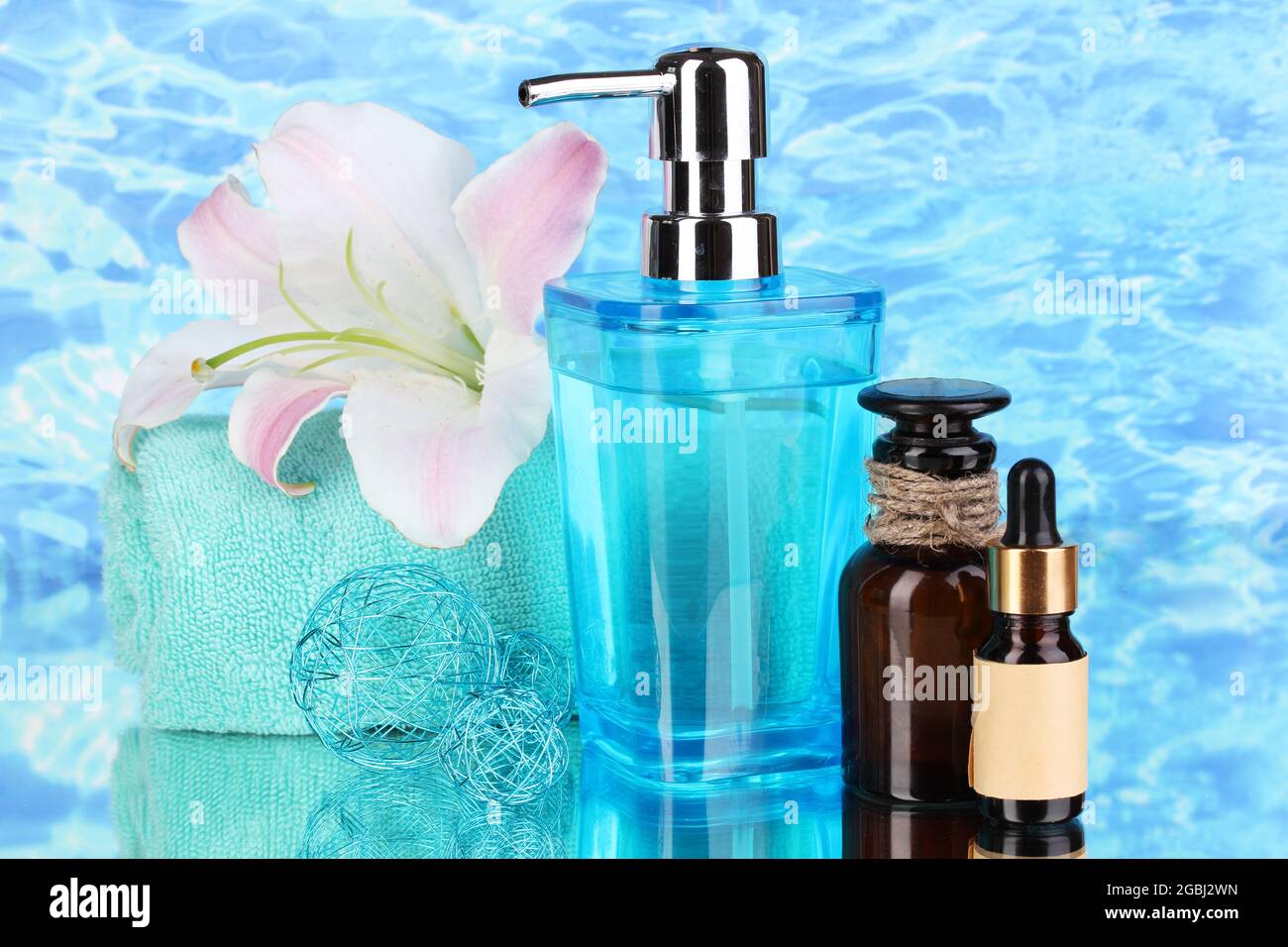Beautiful spa setting on water background with reflection Stock Photo ...