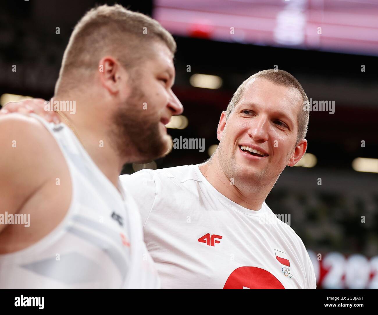 Tokyo, Japan. 4th Aug, 2021. Wojciech Nowicki (R) and Pawel Fajdek of ...