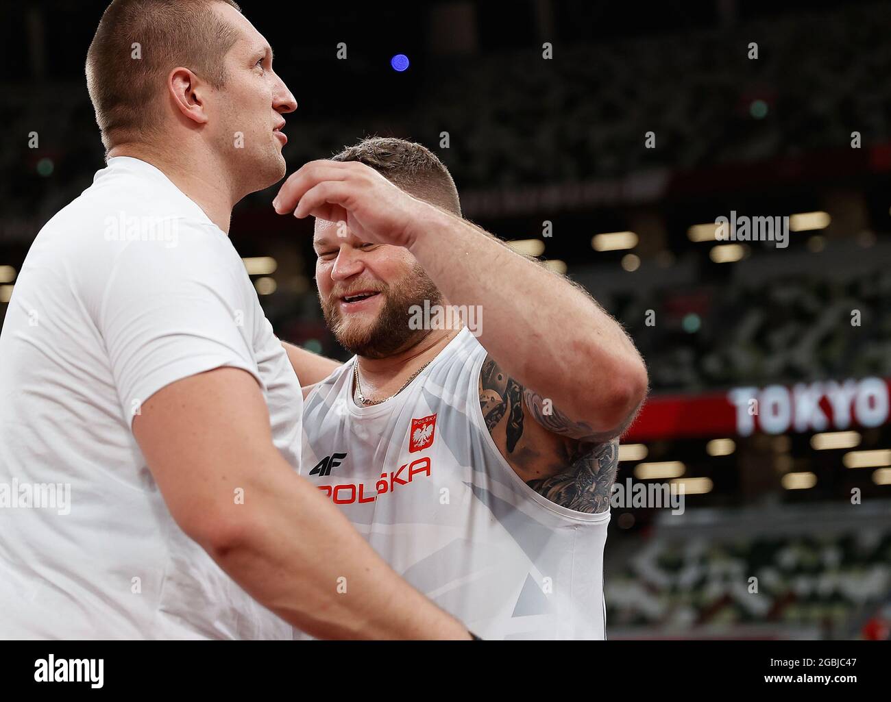 Tokyo, Japan. 4th Aug, 2021. Wojciech Nowicki (L) of Poland celebrate ...