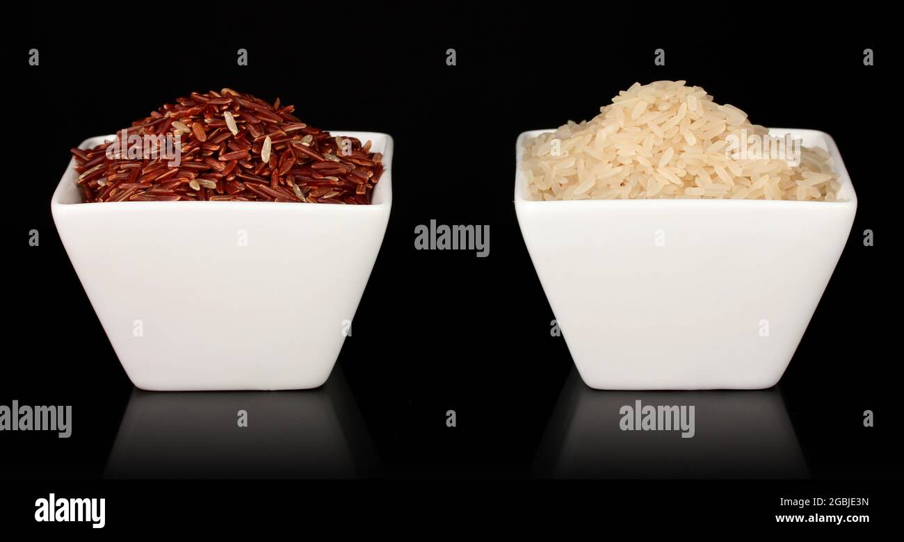Red & white rice isolated on black Stock Photo - Alamy