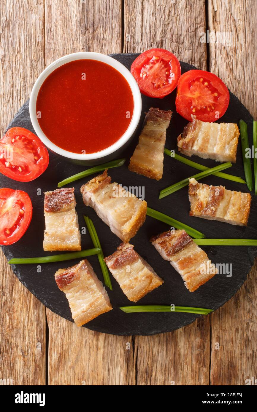 Lechon kawali or lechon de carajay, is a Filipino recipe consisting of ...