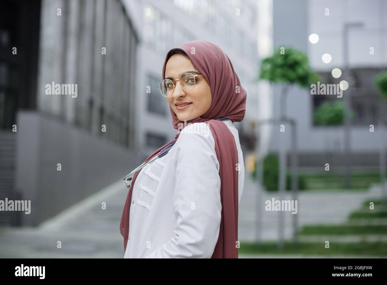 Middle Eastern healthcare worker. Closeup portrait of smiling confident ...