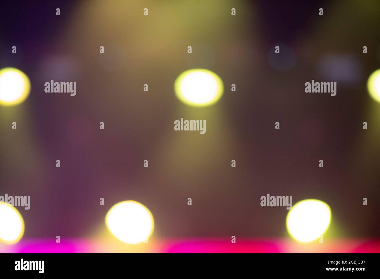 A beige background with white spotlights and a pink stripe Stock Photo ...