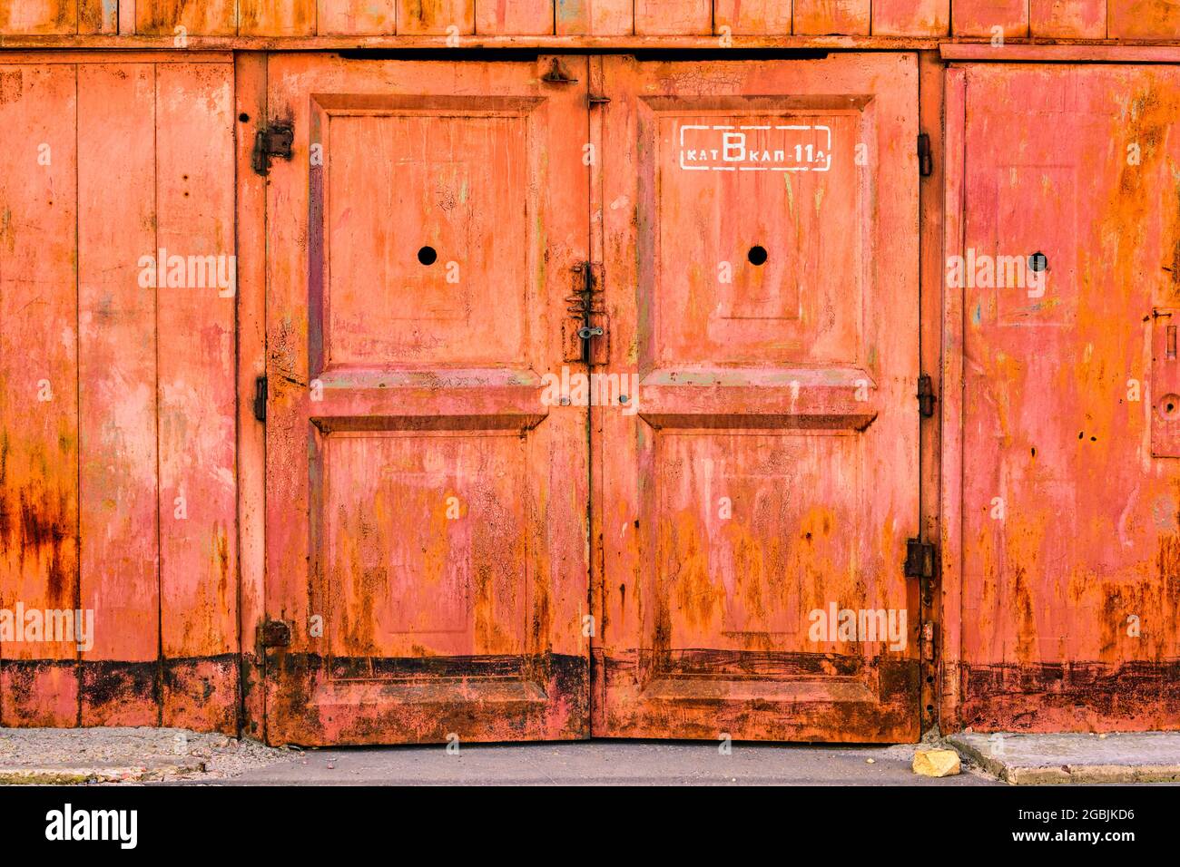 colorful old rusty metal door in stock Stock Photo - Alamy