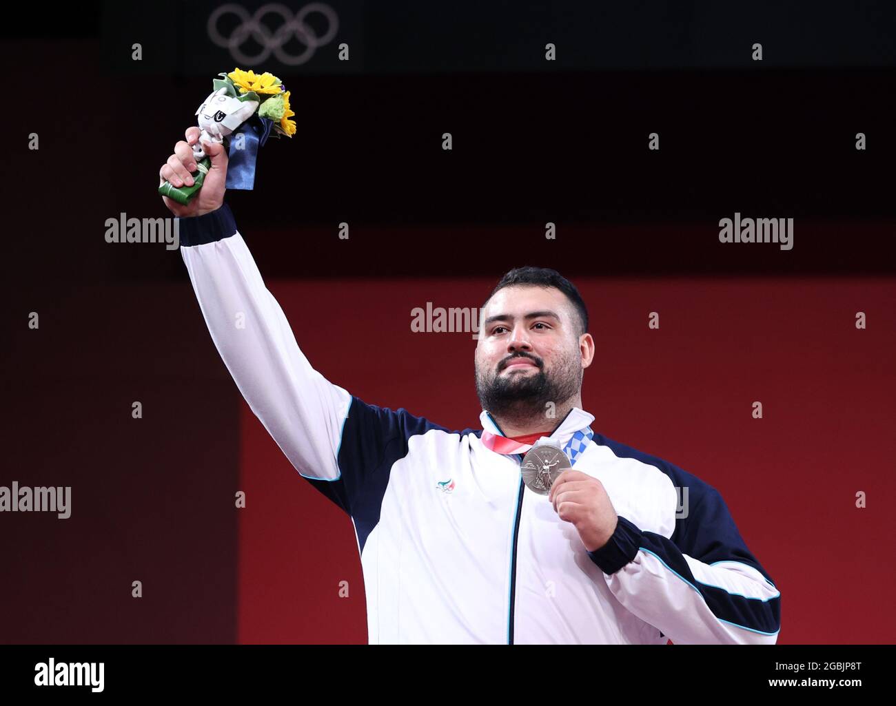 Tokyo, Japan. 4th Aug, 2021. Ali Davoudi of Iran shows his silver medal ...