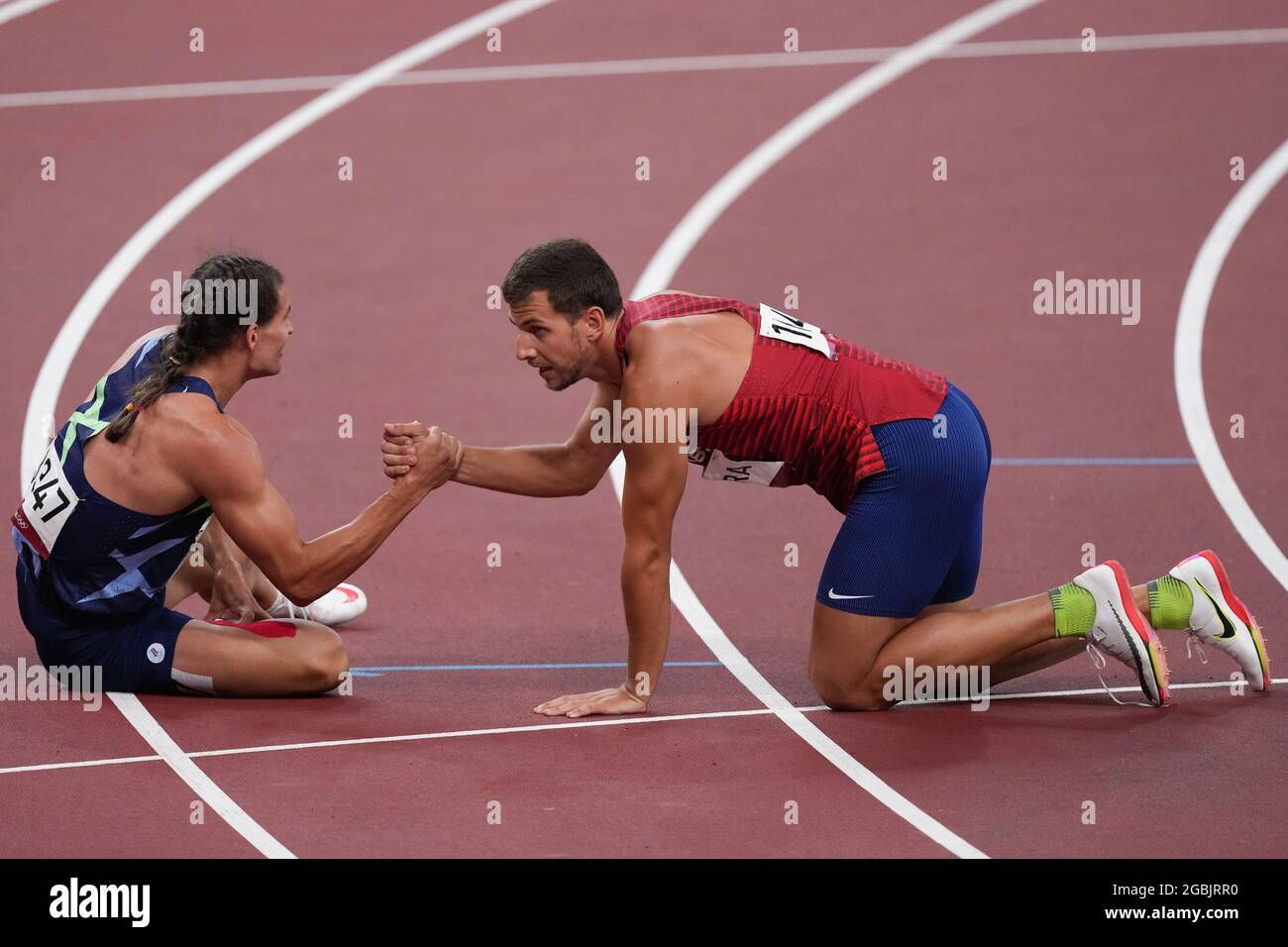 Ilya Shkurenyov of the Russian Olympic Committee (ROC), left, and Jiri ...