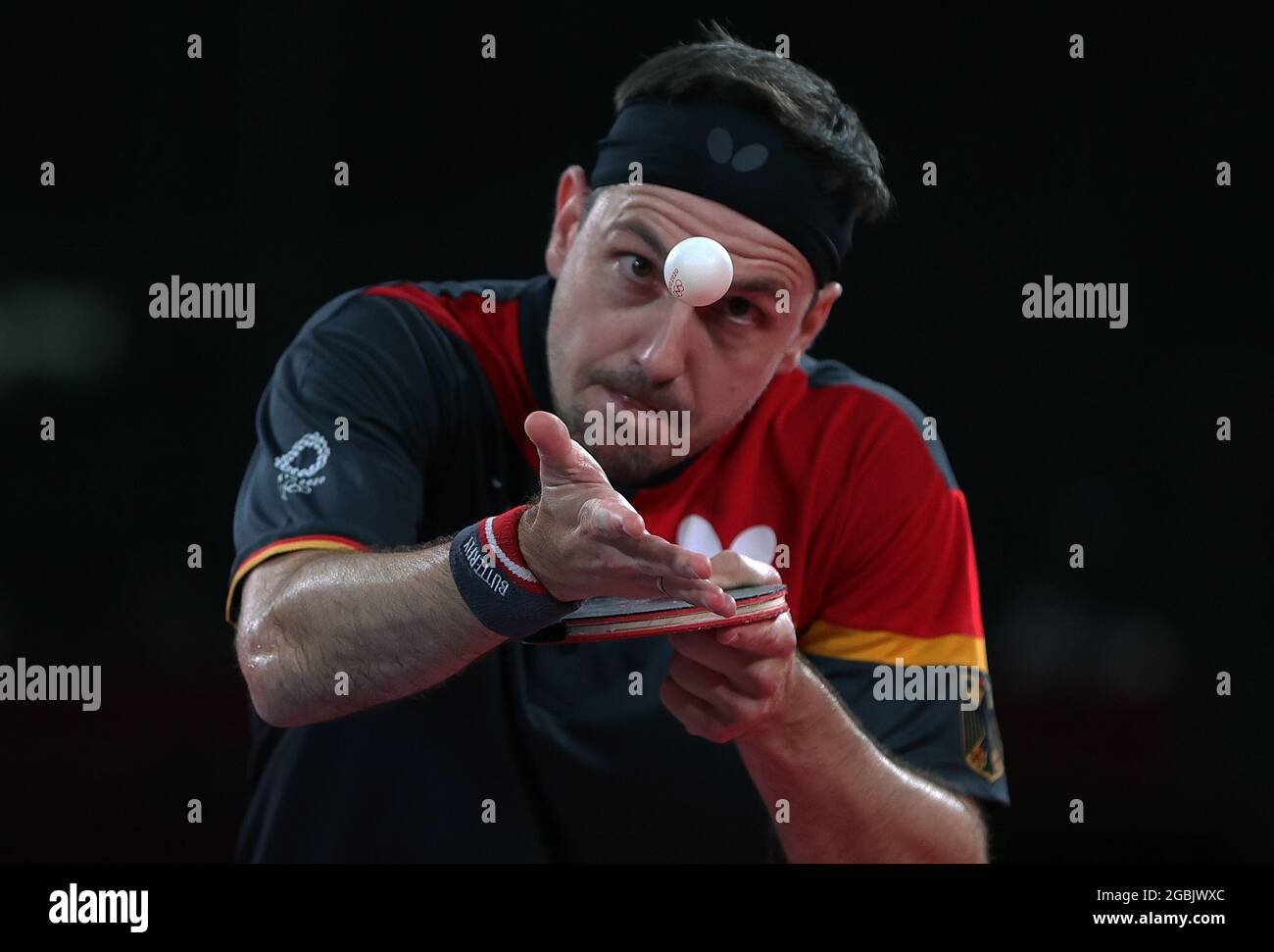 Tokyo, Japan. 4th Aug, 2021. Germany's Timo Boll serves during the ...