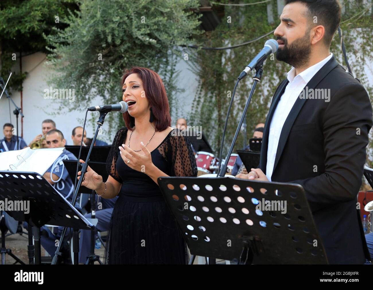 Beirut, Lebanon. 3rd Aug, 2021. Singers perform at a commemoration ...