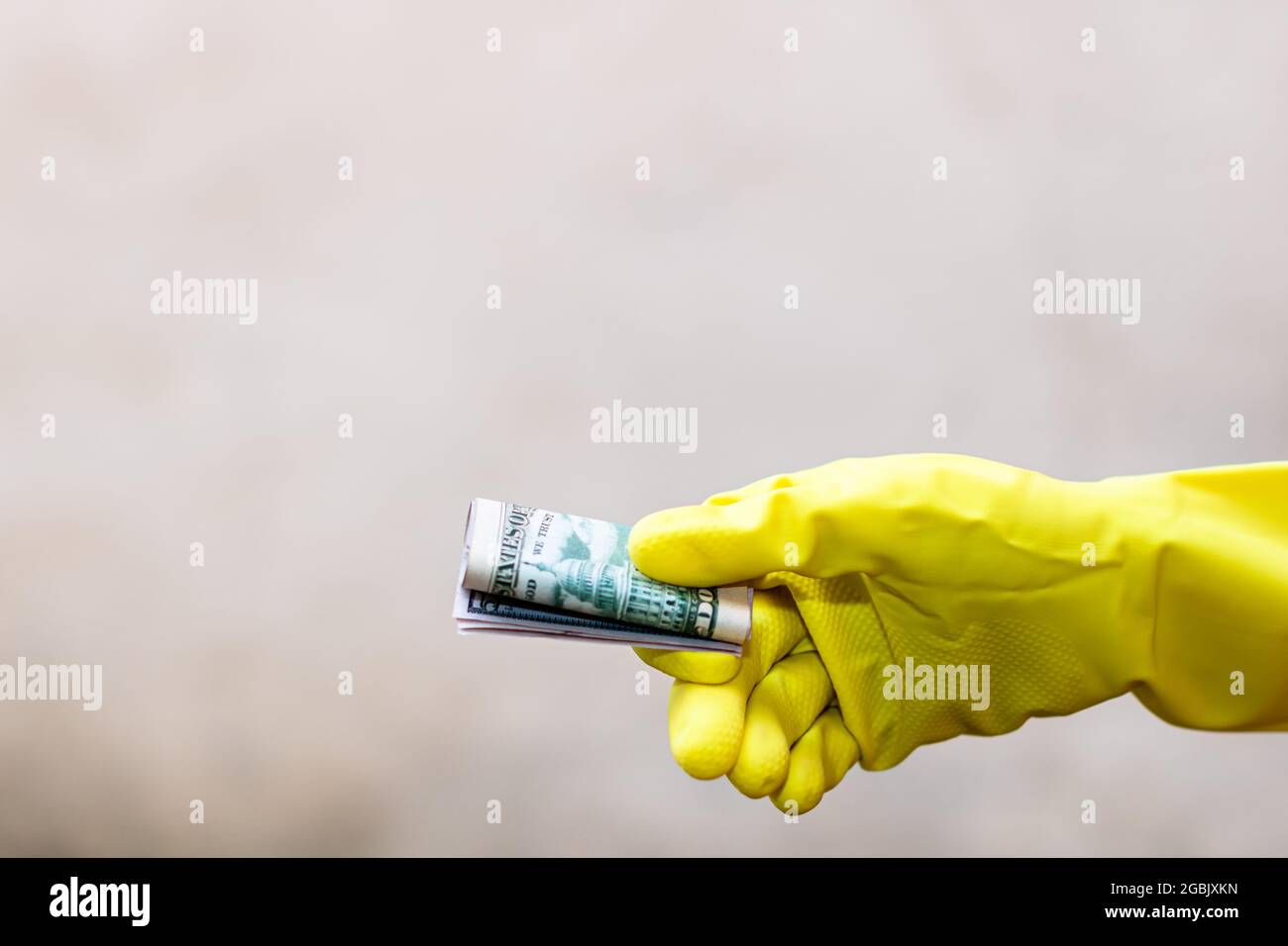 Hand with gloves receiving, giving or holding USD EURO banknote. World ...