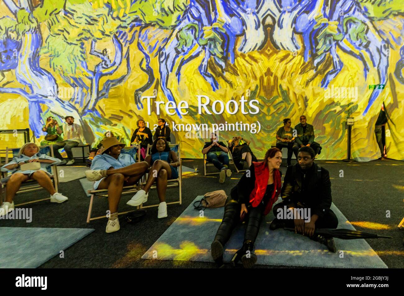 London, UK. 3rd Aug, 2021. The main room with a rolling projection of ...