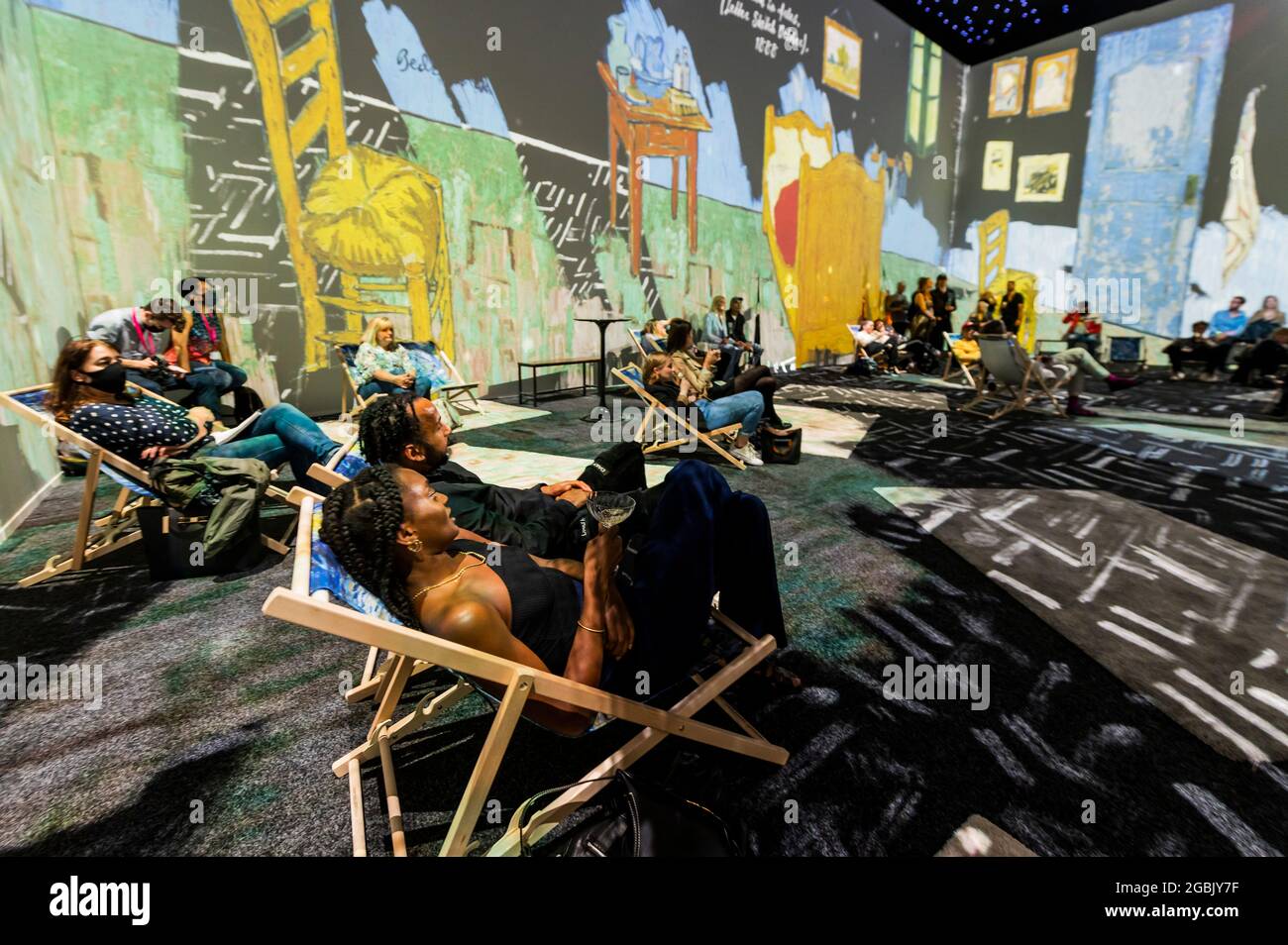 London, UK. 3rd Aug, 2021. The main room with a rolling projection of ...
