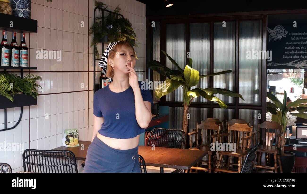 Asian Japanese Model Wearing Casual Attire in Cafe in Thong Lo Bangkok ...