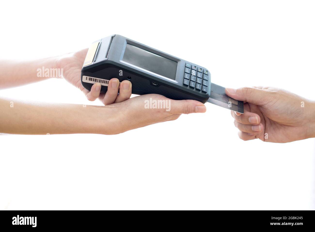 Woman placing credit card into reader Stock Photo - Alamy