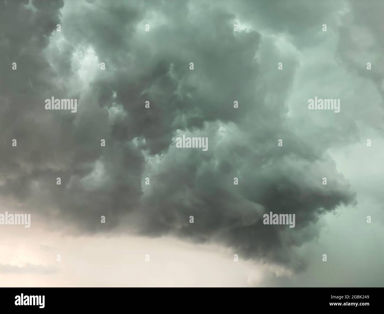 Sunlight and heavy rain clouds hi-res stock photography and images - Alamy