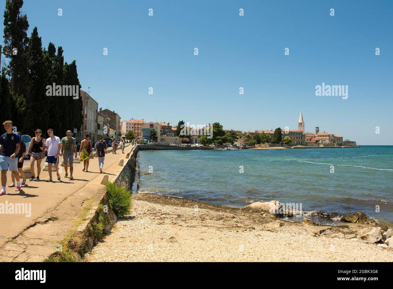 Porec, Croatia- July 10th 2021. A coastal road in the harbour area of ...