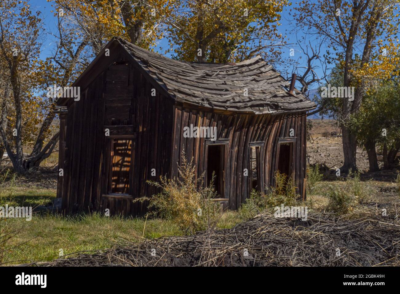 Old abandoned wooden hut with broken windows in a countryside Stock ...