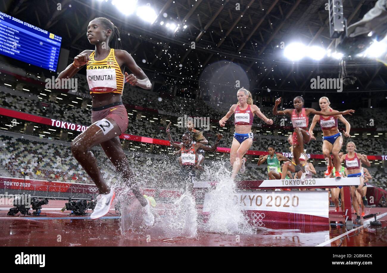 Peruth Chemutai of Uganda (L) competes en route to winning the women's ...