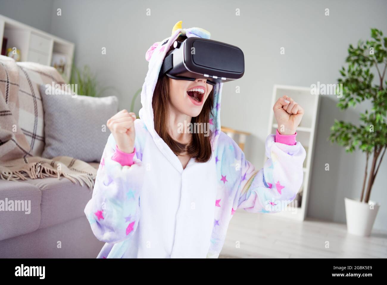 Photo of crazy winner adorable childish gamer lady enjoy game ...