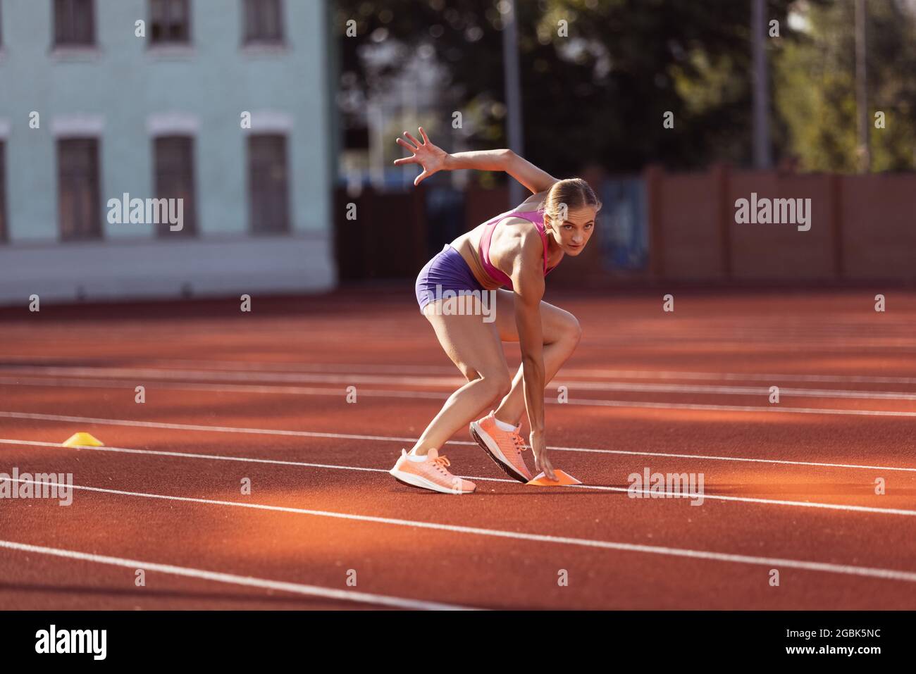 Young Caucasian woman, female athlete, runner practicing alone at ...