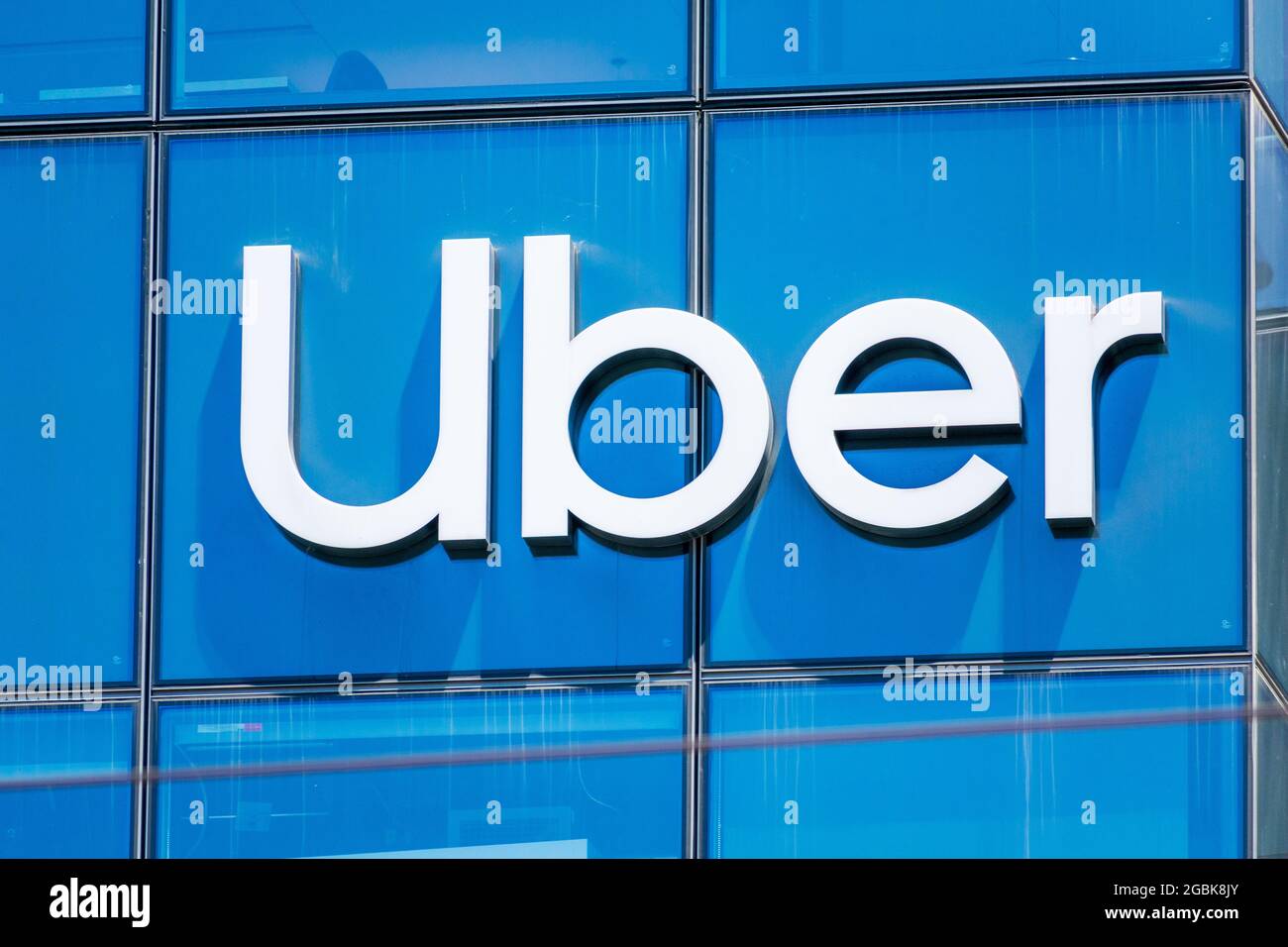 Uber sign at world headquarters of Uber Technologies in Mission Bay ...