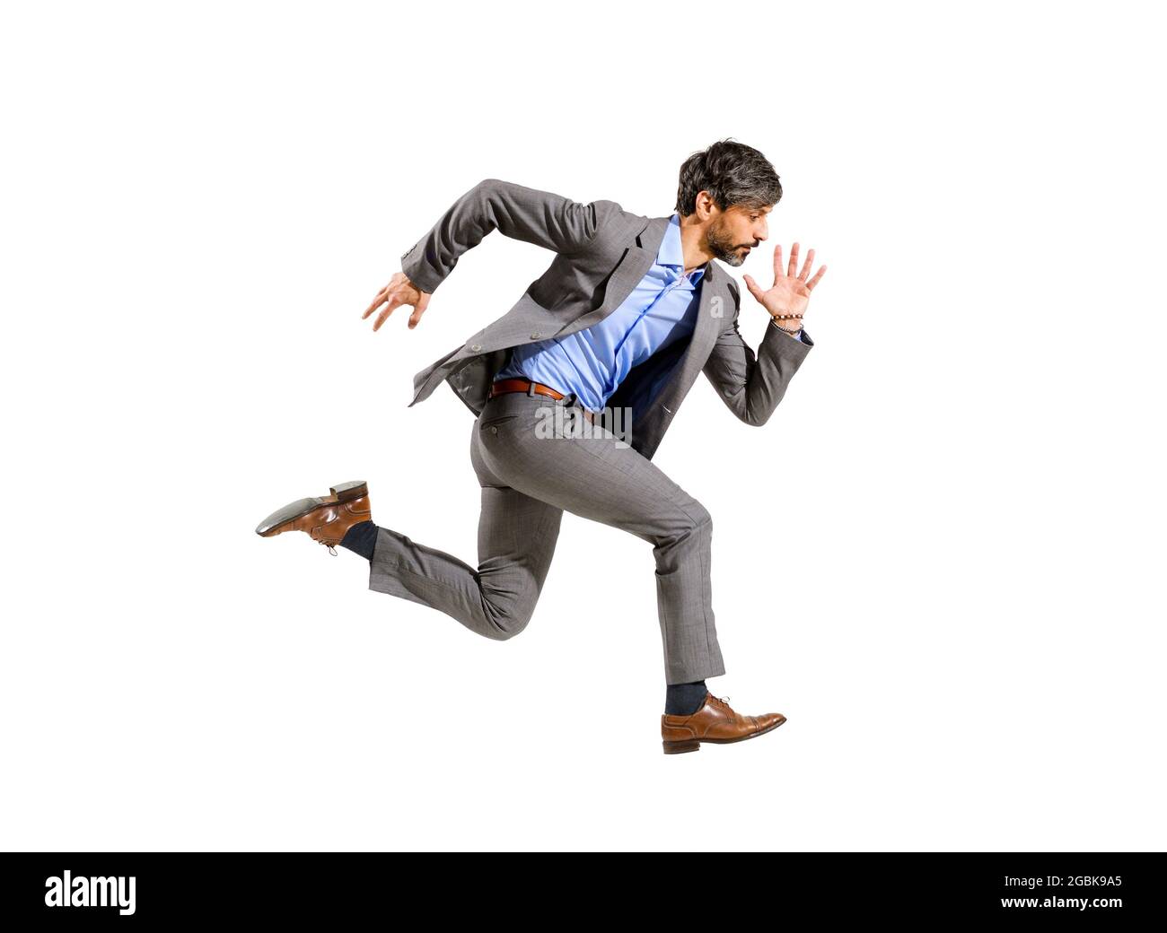 Man in suit running hi-res stock photography and images - Alamy