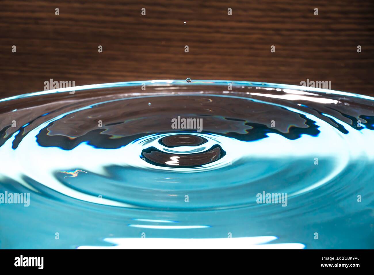 Clear Waterdrop with circular waves. Splashes closeup. Water splash and ...