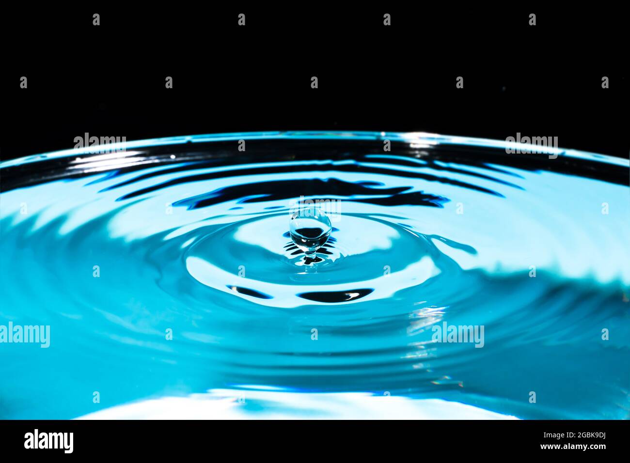 Clear Waterdrop with circular waves. Splashes closeup. Water splash and ...