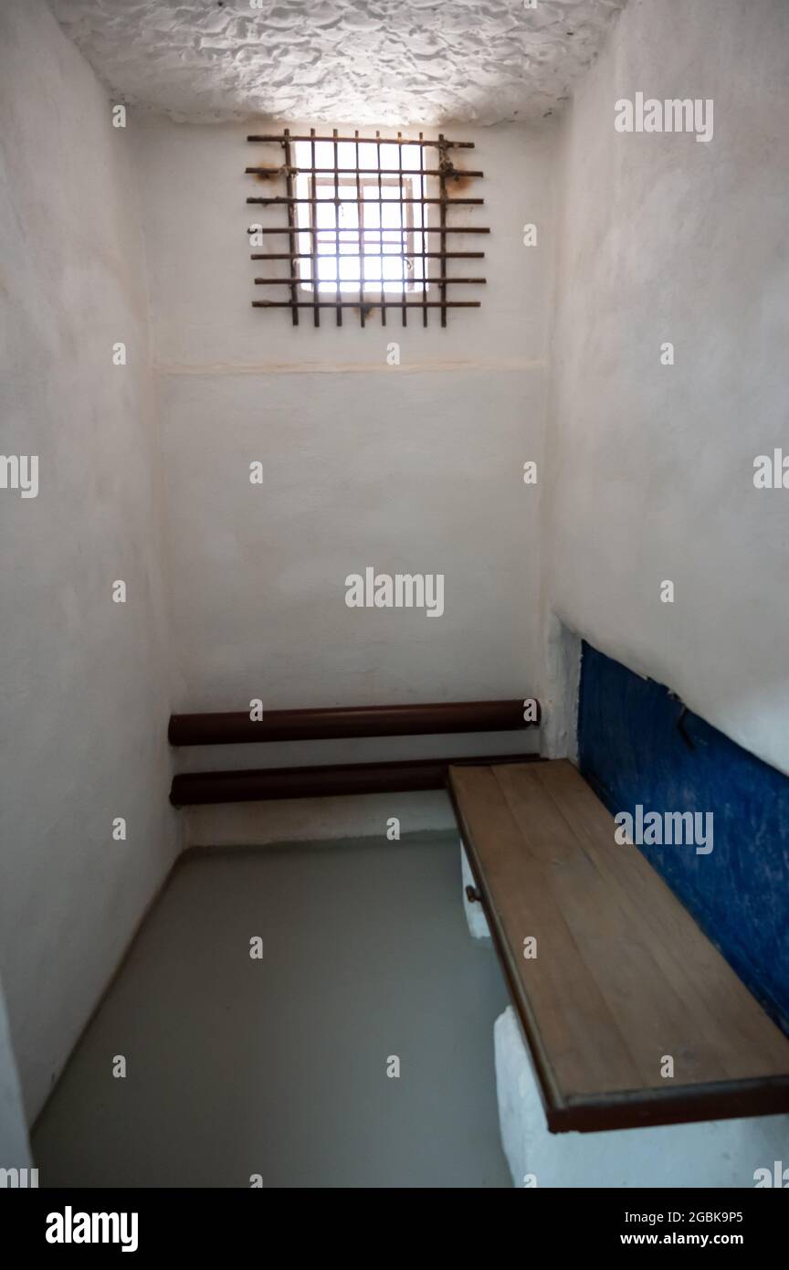 Empty loner prison cell with bars on the window Stock Photo - Alamy