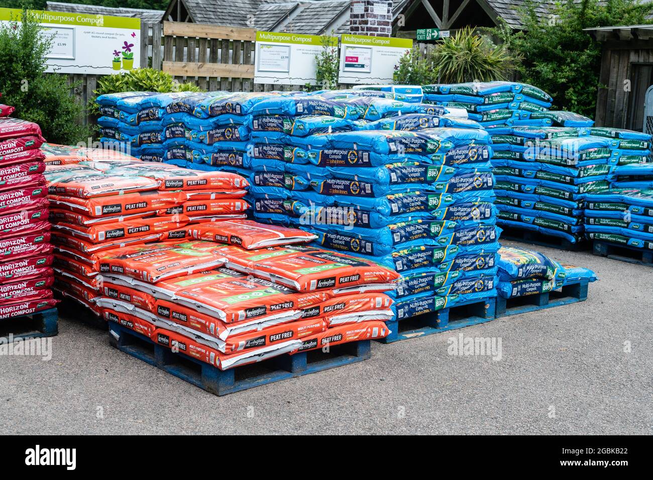 Bags of Compost at garden centre Stock Photo - Alamy