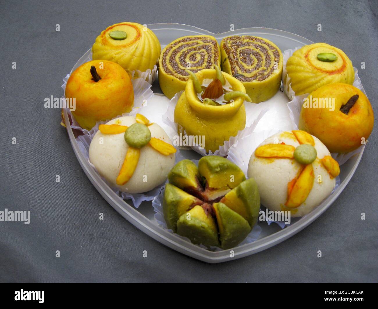Varanasi, India. Nicely decorated sweet Indian pastries presented in ...