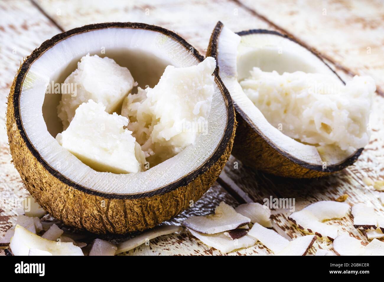 Brazilian coconut candy, called "cocada", inside two open coconuts, on ...