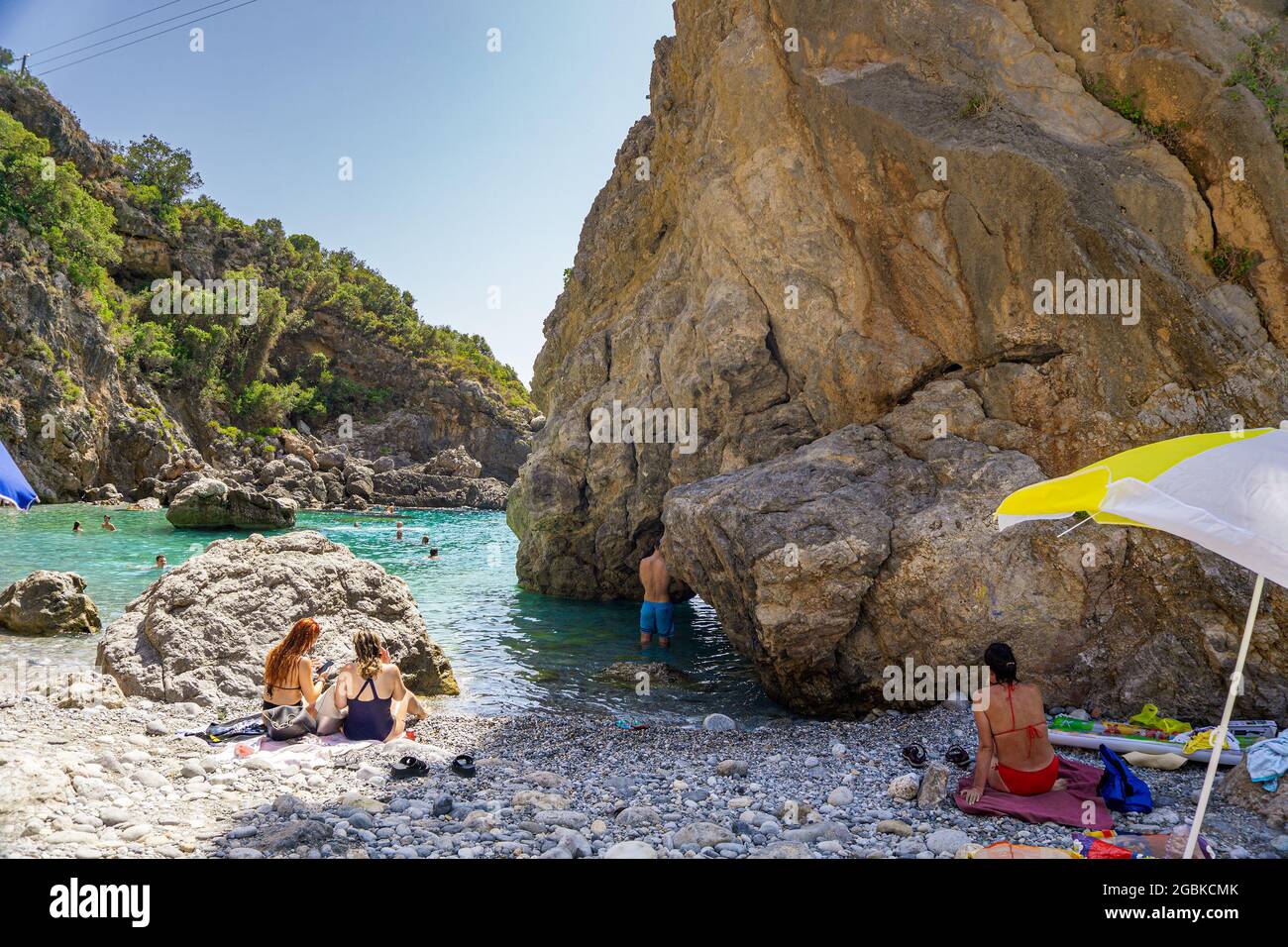 Panoramic view of Foneas beach overcrowded with tourists and swimmers ...