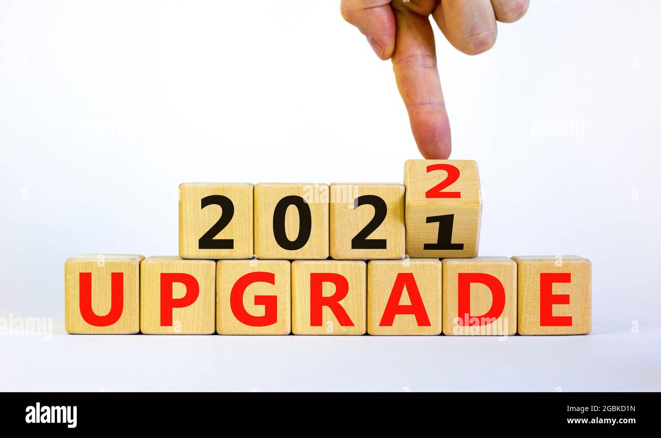 Symbol Of Planning 2022 Upgrade New Year Businessman Turns A Wooden