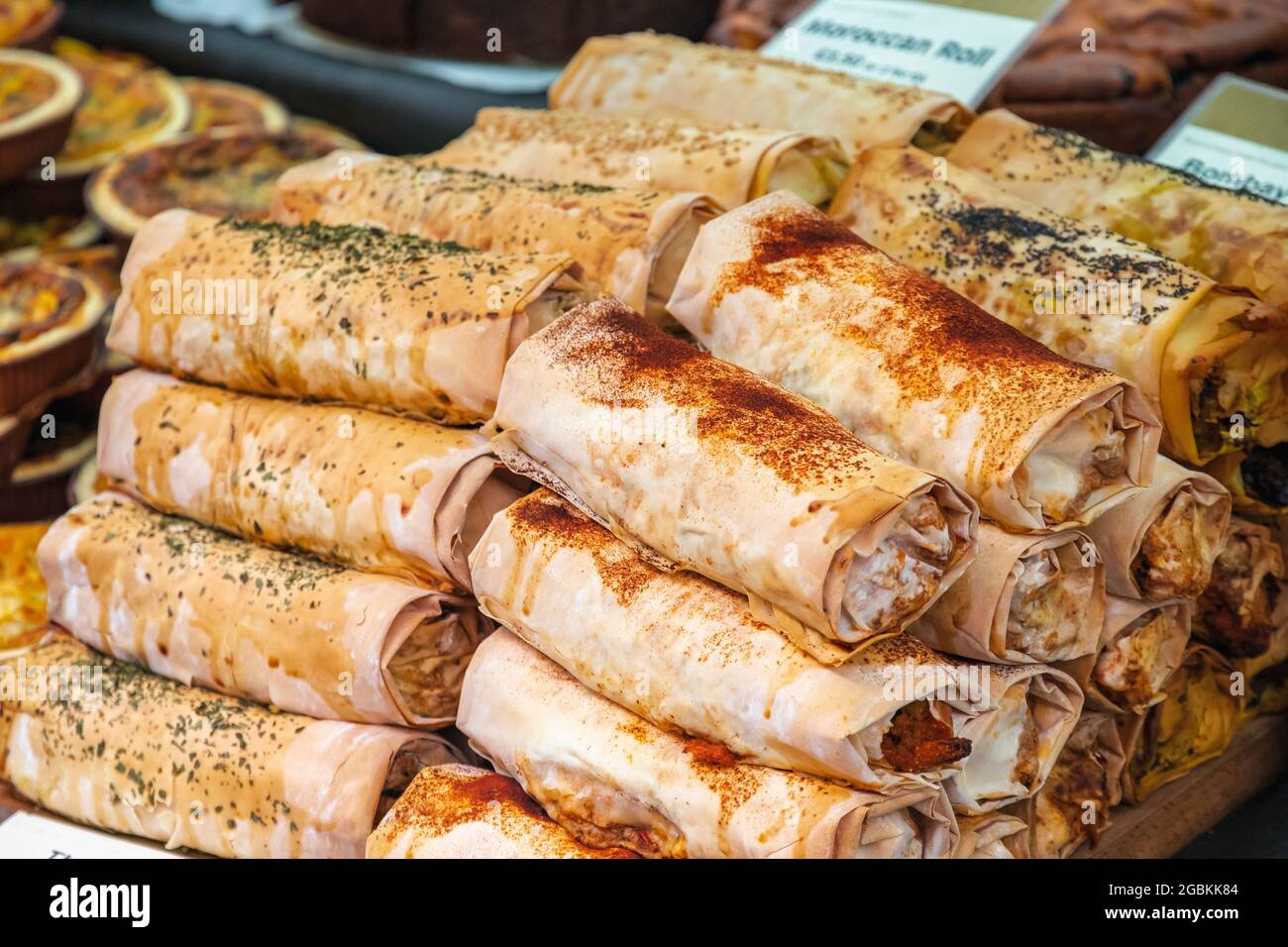 Curry rolls on display at Broadway market, a street market in Hackney ...