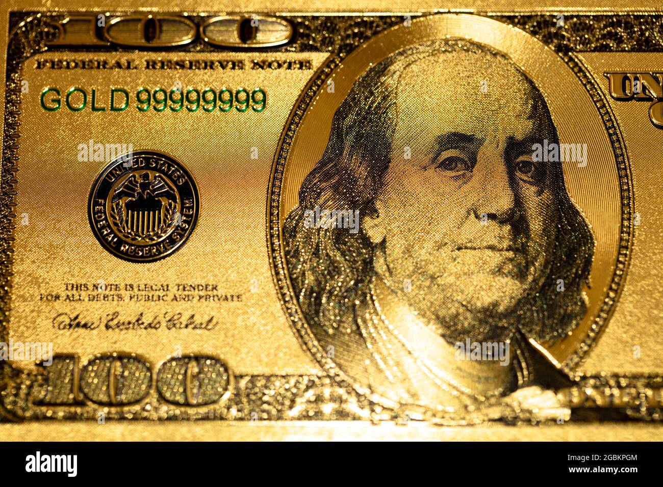 golden 100 US dollar banknote for design purpose Stock Photo - Alamy