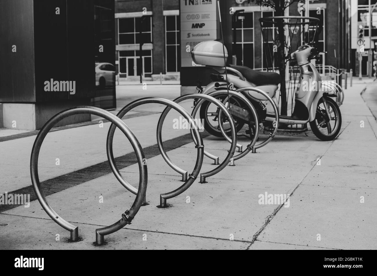 bike rack on a sidewalk in downtown Winnipeg, Manitoba, Canada Stock ...