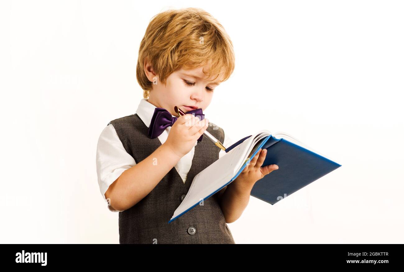 Child writing with pencil hi-res stock photography and images - Alamy