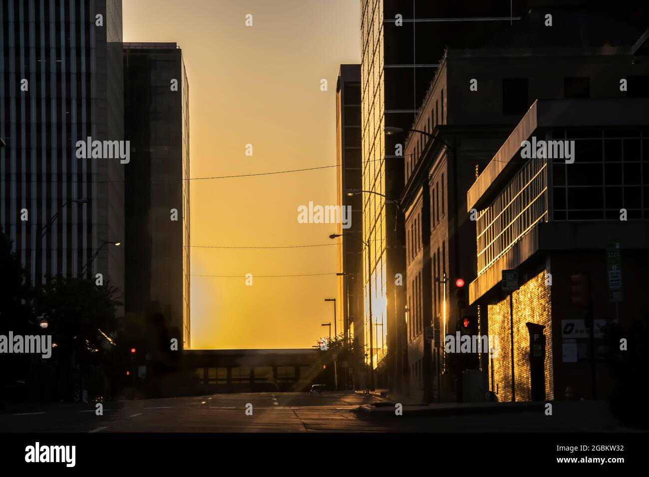 Up empty pavement and street in morning sun hi-res stock photography ...
