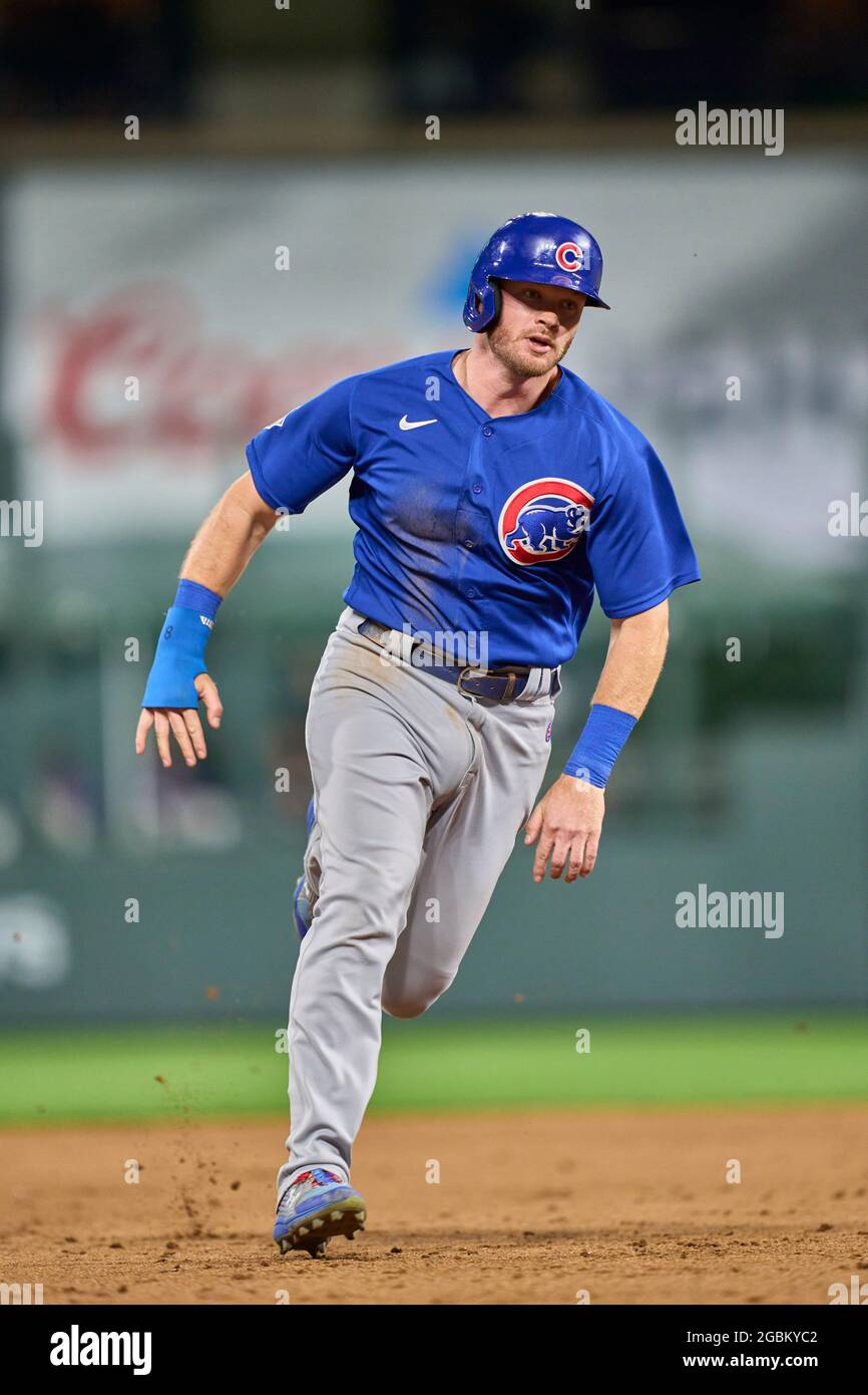 August 3 2021: Chicago Cub left fielder Ian Happ (8) runs to third ...