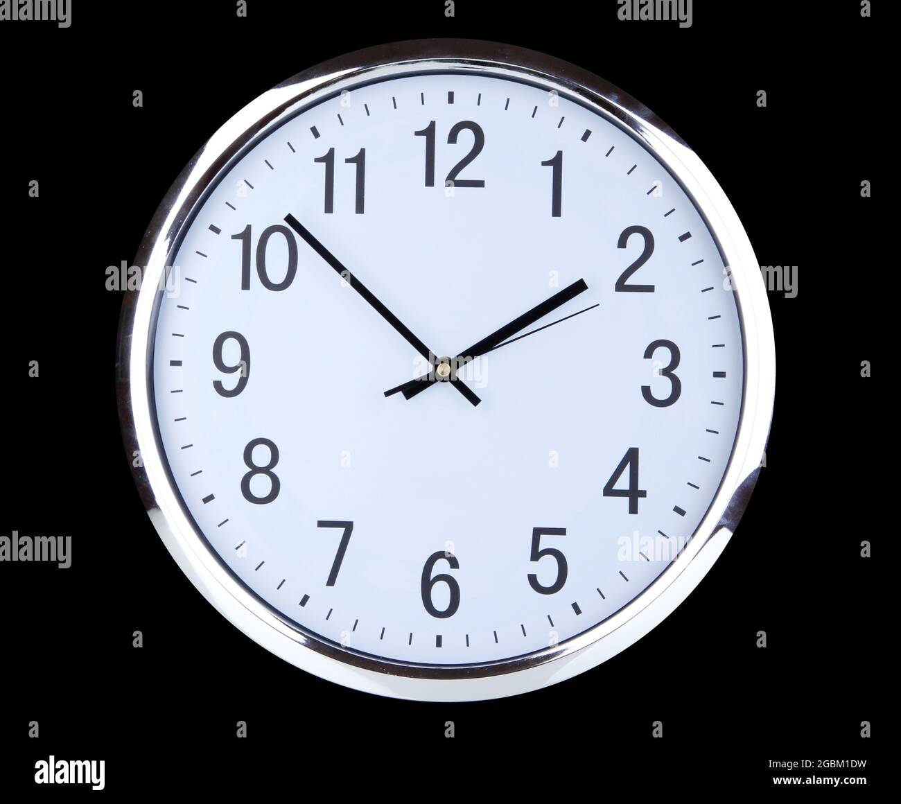 round office clock on black background Stock Photo - Alamy