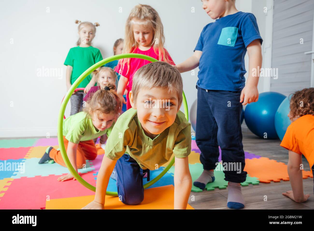 Portrait of laughing boy looking closely at the camera Stock Photo - Alamy