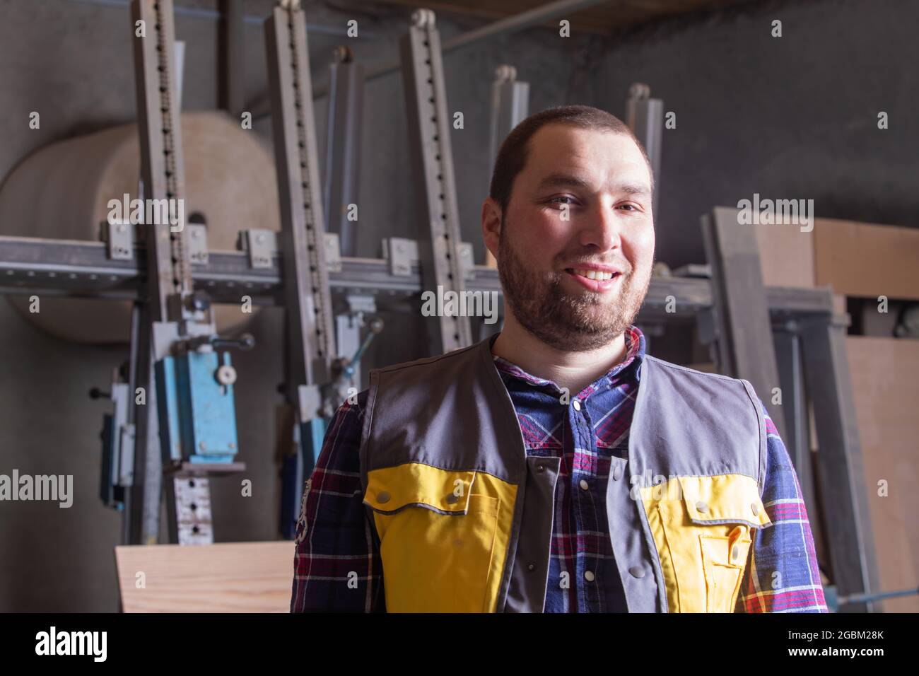 Manufacturing happy carpenter man hi-res stock photography and images ...
