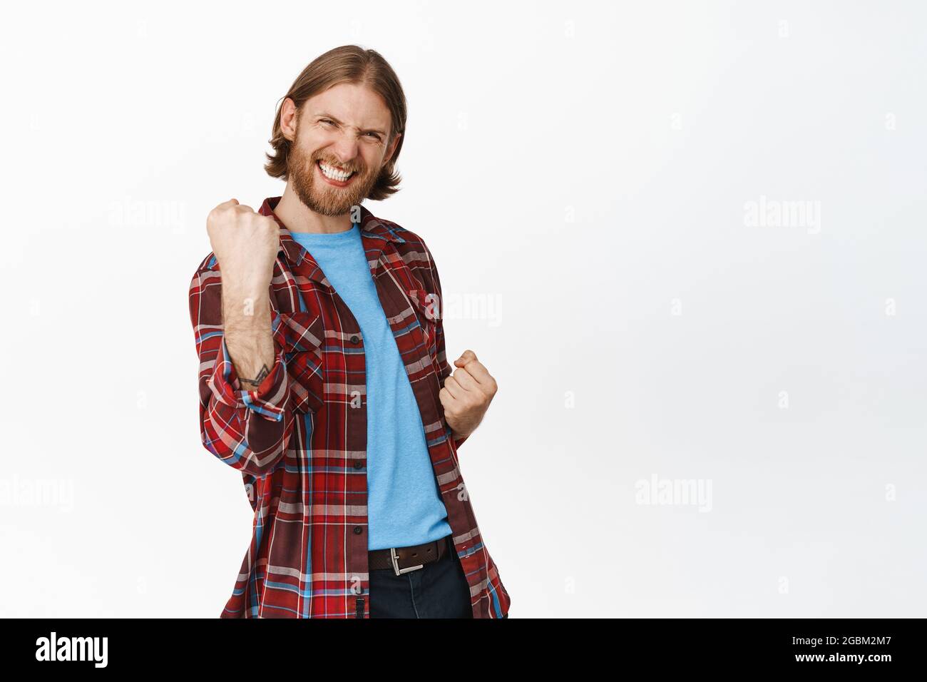 Yes winner. Excited blond man celebrating victory, triumphing and ...