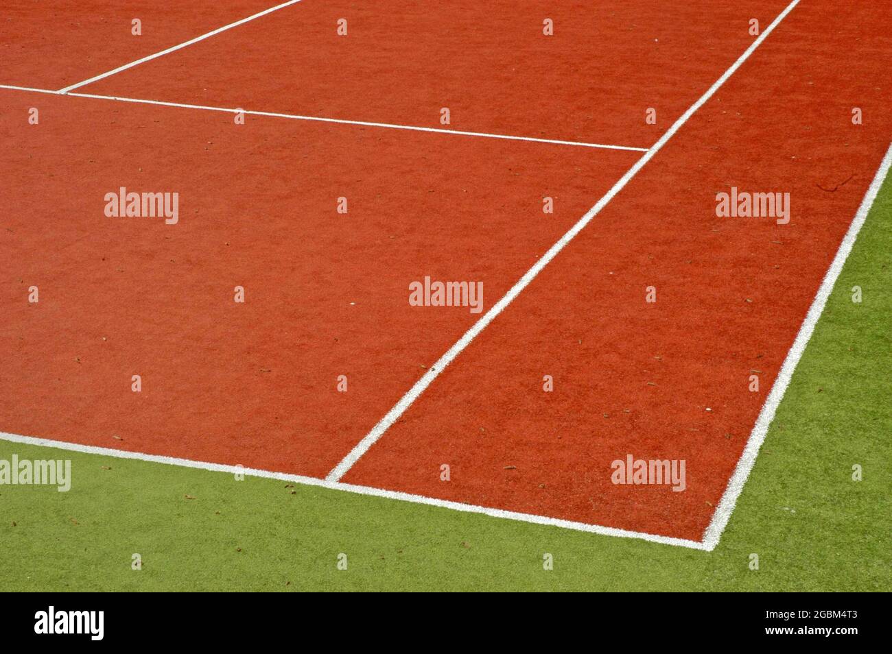 Closeup shot of a red surface of the tennis court corner area Stock ...
