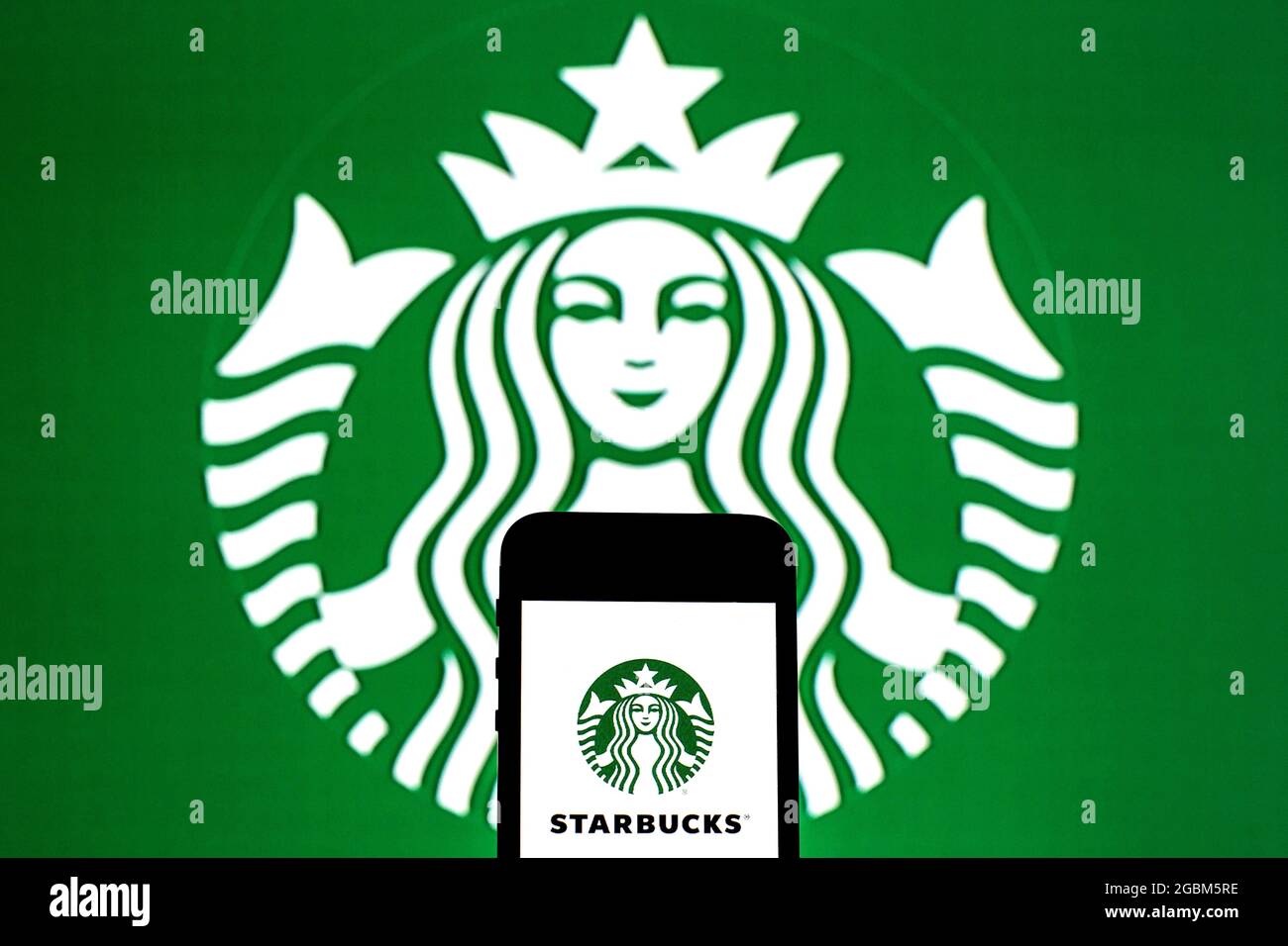 Spain. 3rd Aug, 2021. In this photo illustration, a Starbucks logo seen ...