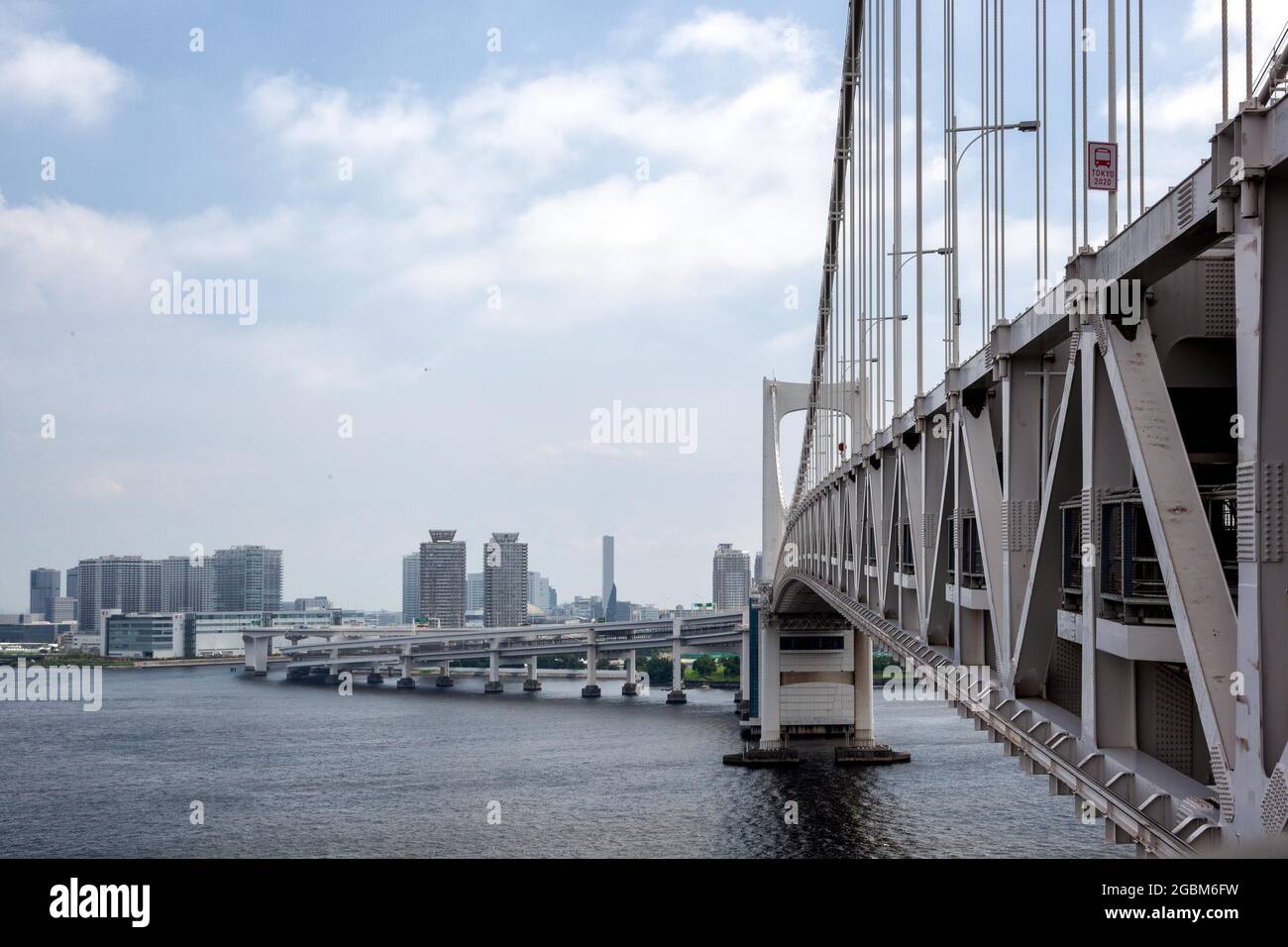 Tokyo, Japan. 28th July, 2021. The Rainbow bridge connecting Shibaura ...