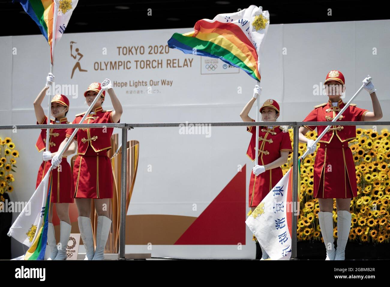 Participants seen waving flags during the Tokyo Olympics 2020 Torch ...