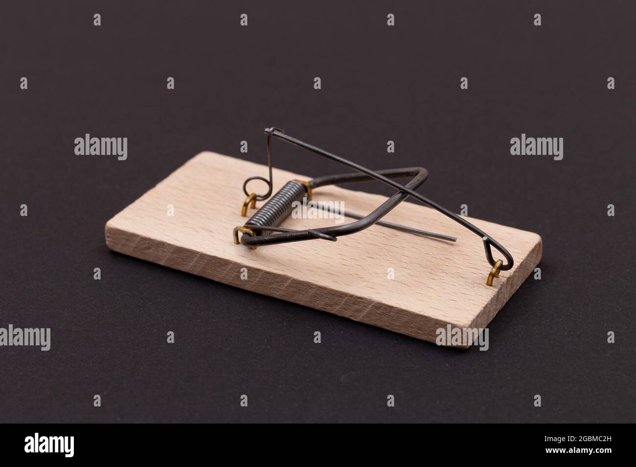 Wooden Mouse Trap. Empty Loaded Mousetrap on Black Background Stock ...