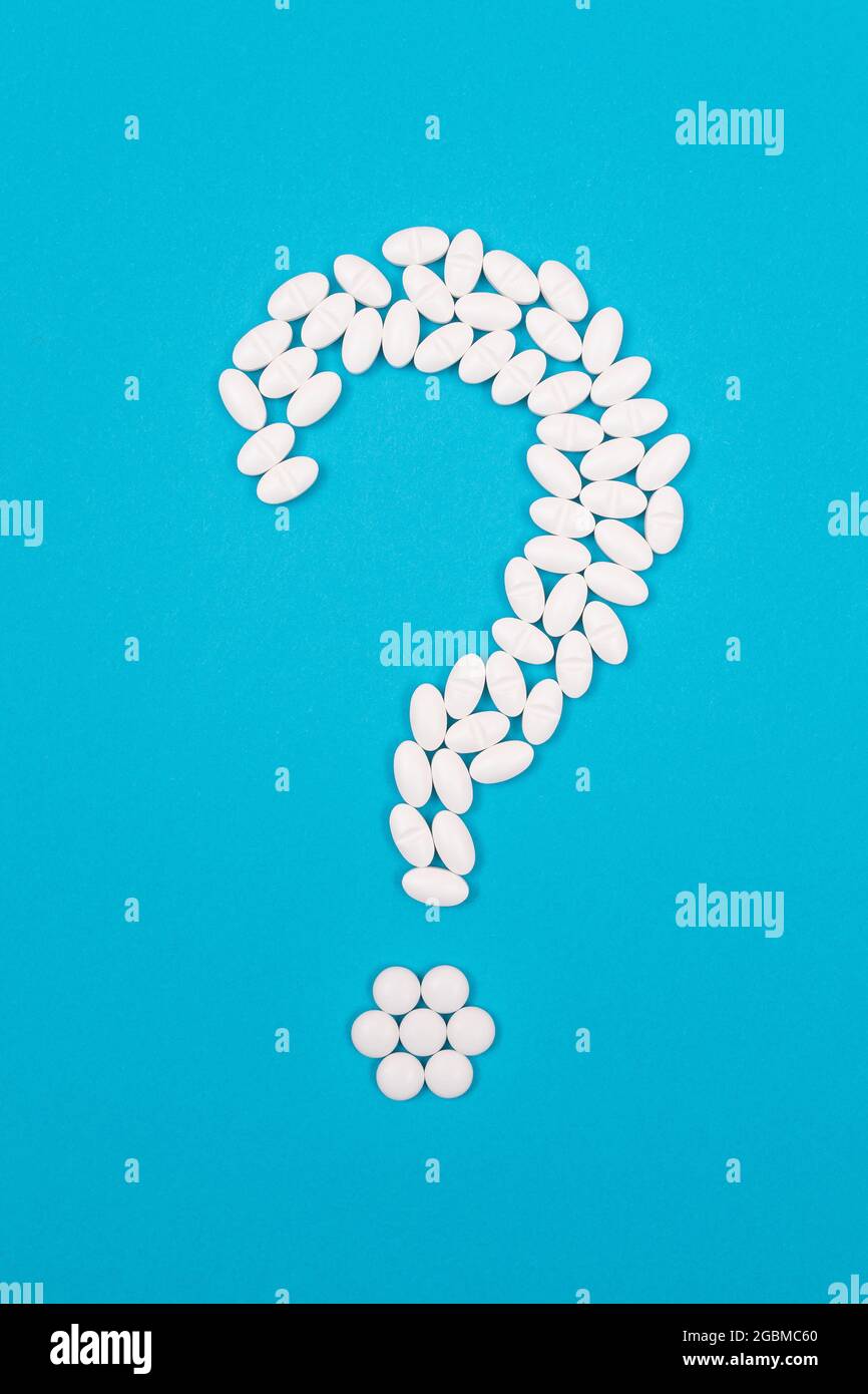 Question Mark Made from White Pills and Tablets, Lying on Blue ...