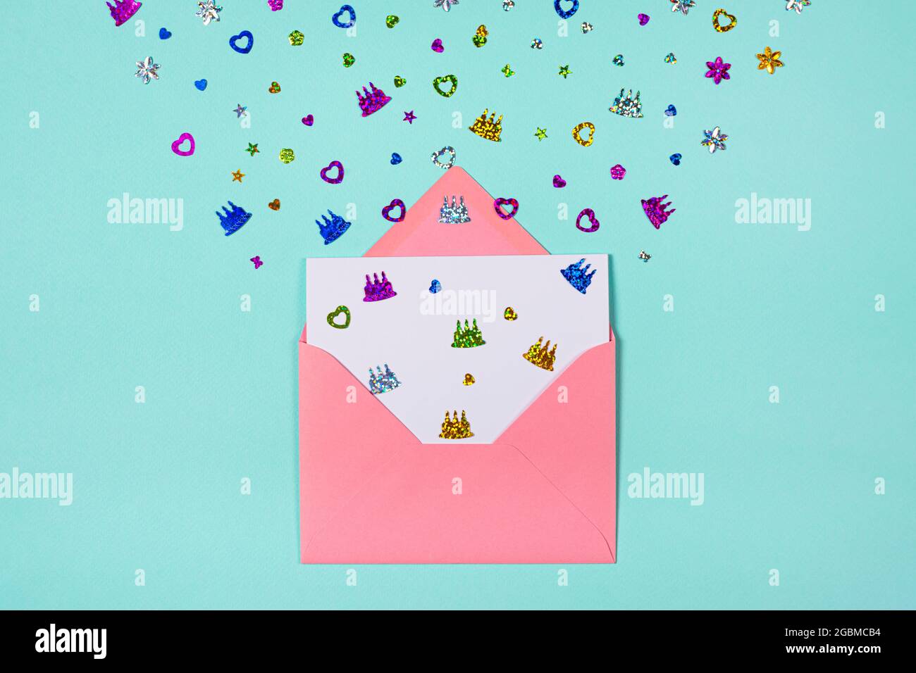 Pink Envelope with party confetti explosion on blue or turquoise ...